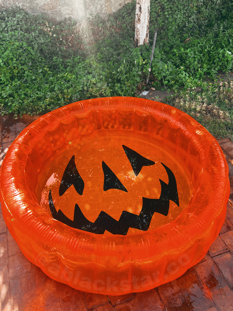 Summerween Pumpkin Swimming Pool – A Black Star